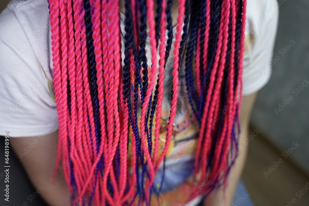 African braid with Kanekalon on a model, afro-locks on a frame, frame ...