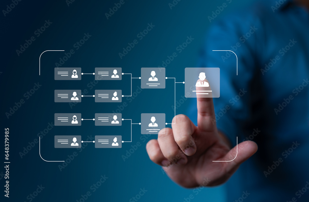 Businessman hand point on organization chart, mind map, or organigram ...