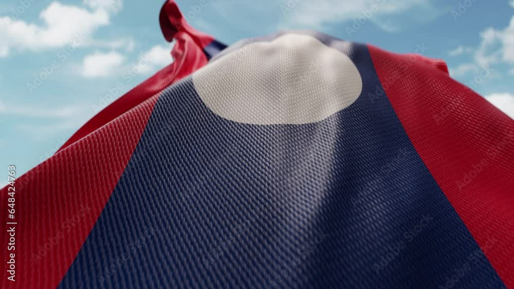 Wavy flag of Laos blowing in the wind in slow motion. Waving colorful ...