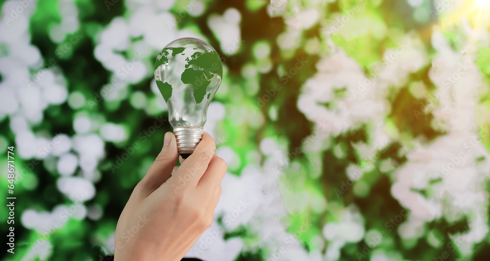 lightbulb with world map on blur green background for Greenhouse gas ...