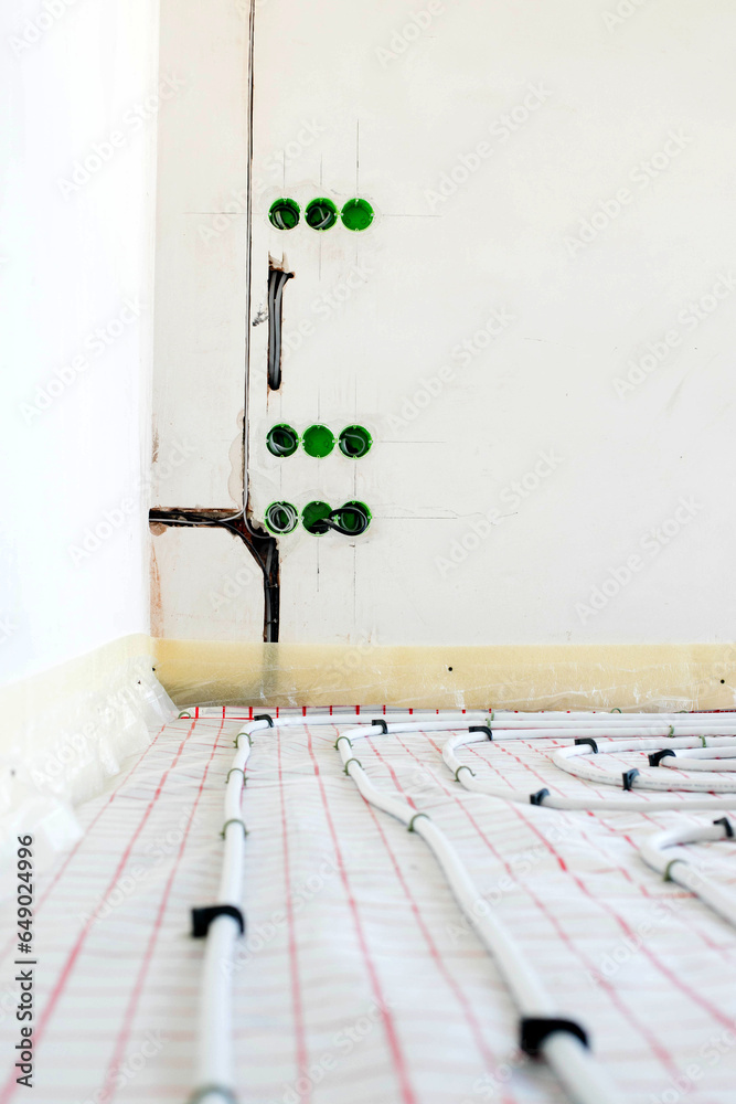 Installation of underfloor heating pipes for water heating. Heating ...