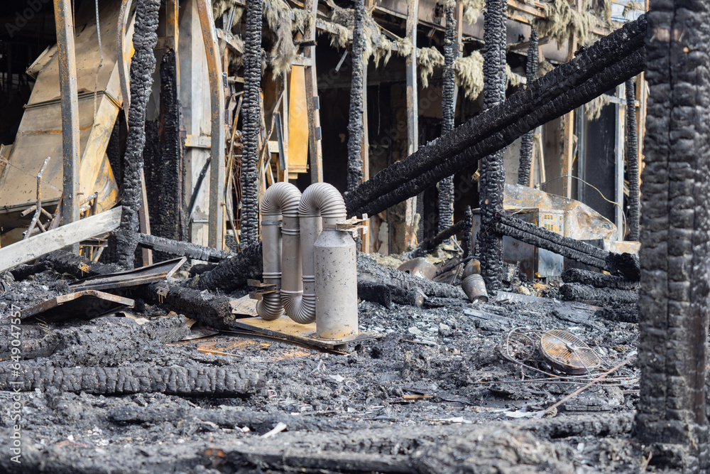 Destroyed house. Ruins burnt building. Cottage after fire. Building was ...