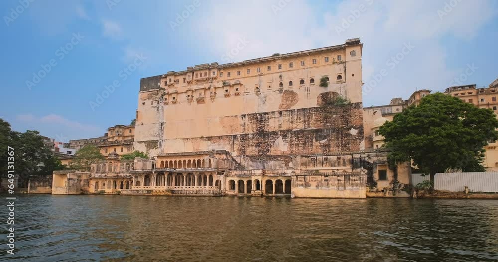 Udaipur City Palace view from moving boat on lake Pichola. Luxury ...