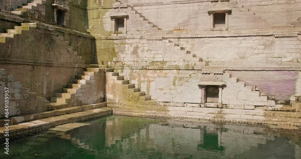 Water storage inside Toorji Ka Jhalra Baoli and stepwell, one of water sources in Jodhpur ...