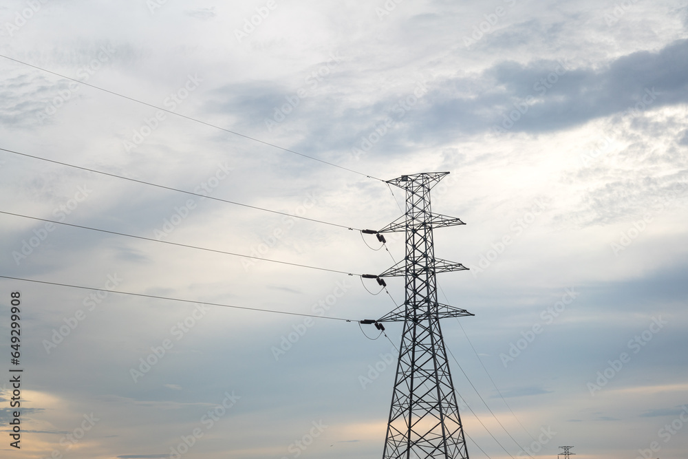 Poster High voltage electricity pole with pylon cable lines on clould ...