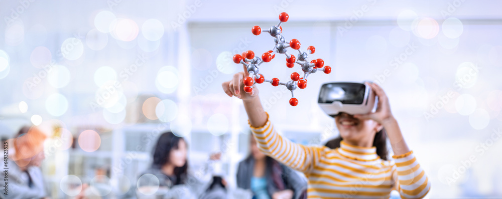 Girl using VR glasses learning molecular model chemistry science at ...