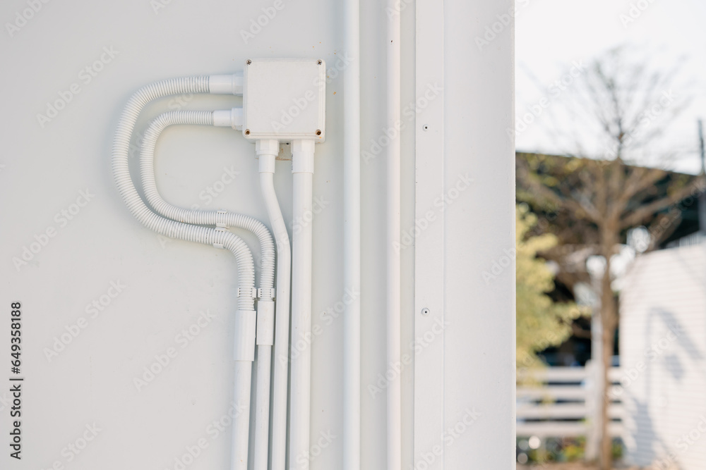 Professional outdoor electrical wiring wall installation with PVC ...