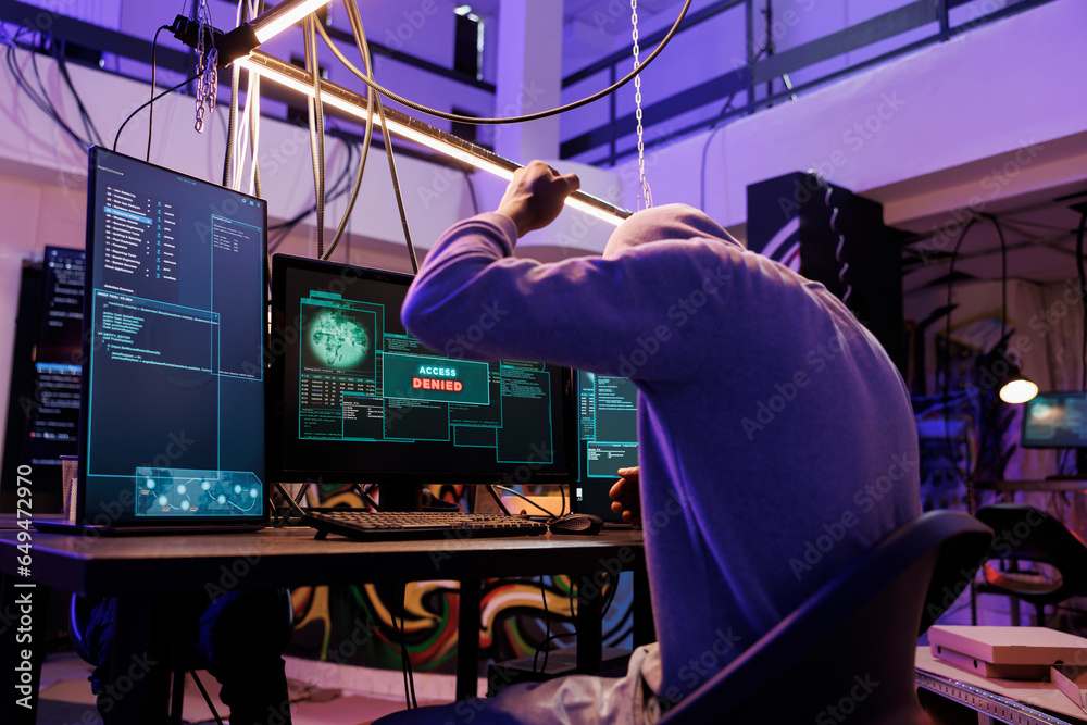 Hacker getting access denied message on computer screen while breaking ... Hacker getting access denied message on computer screen while breaking ...