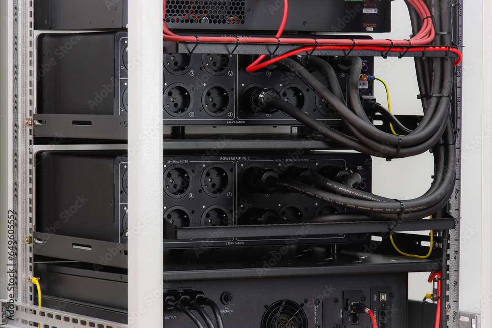 The mains power connector is connected to an electrical outlet in the ...