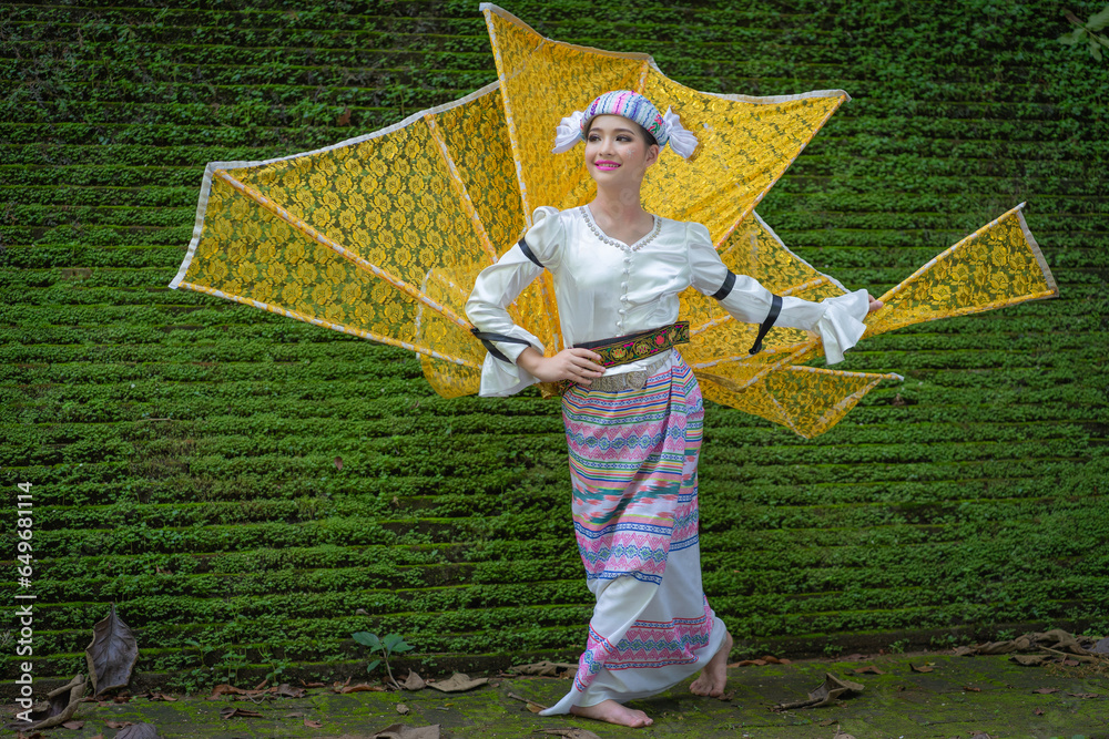 Beautiful girl the Burmese Art dancing performs imitating bird wings ...