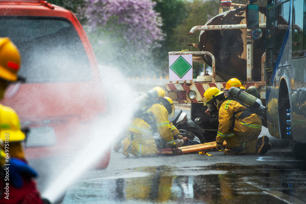 Rescue workers wear bio hazard suits. With an oxygen tank inside ...