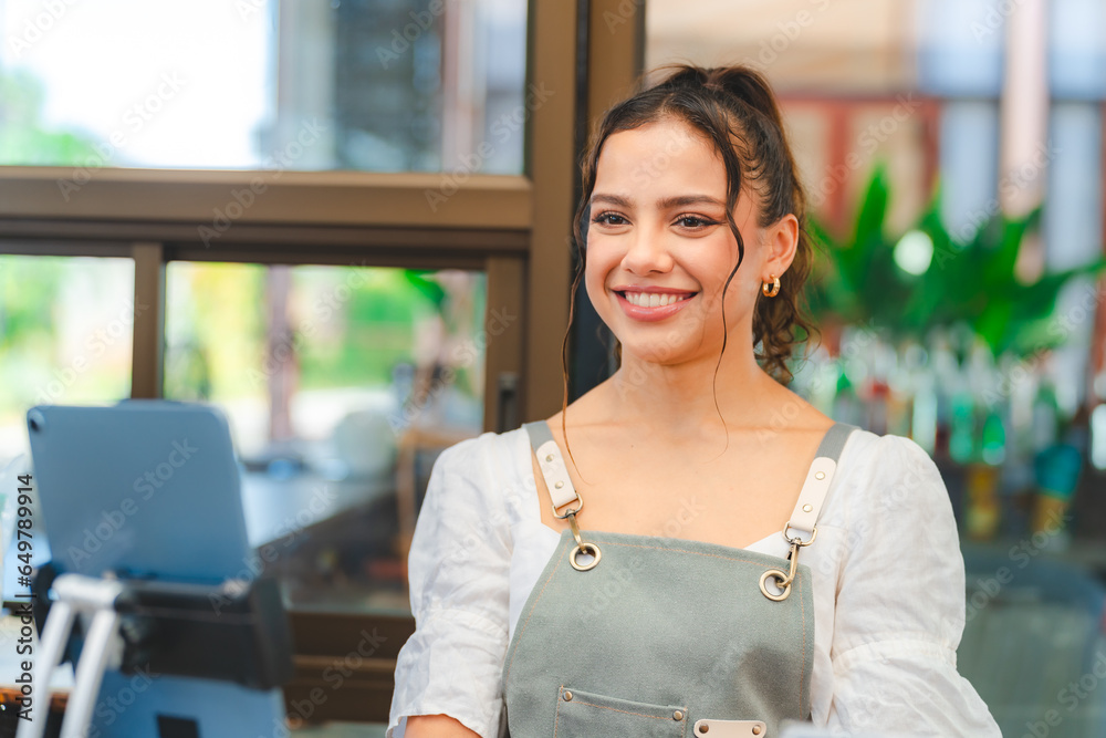 Zdjęcie Stock: Happy smile waitress standing at restaurant, Young ...