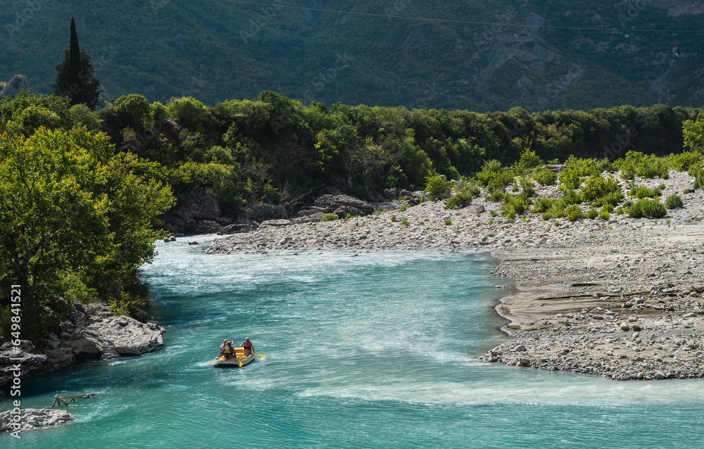 White water rafting. Adventure and sport. A yellow raft floating among ...