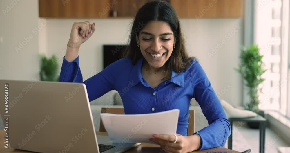 Indian woman read papers sit at desk with laptop, got unbelievable news ...