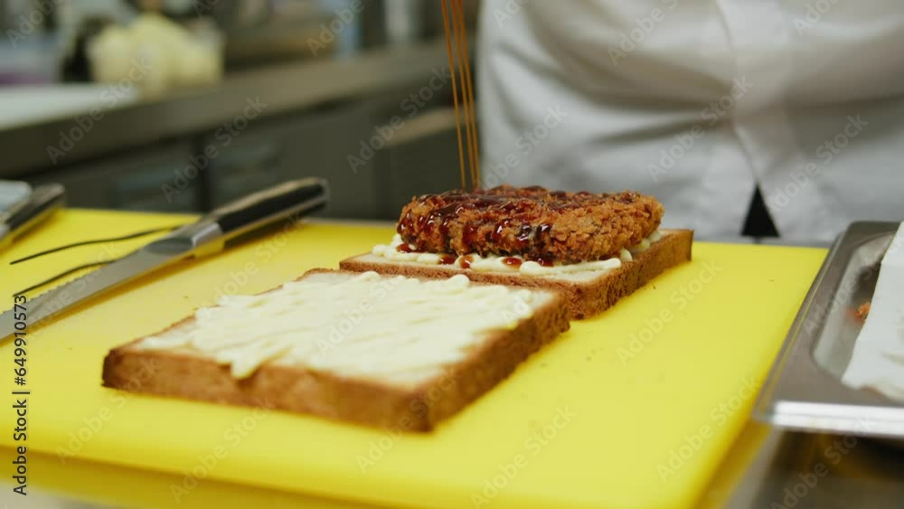 Chef cooking Katsu Sando japanese sandwich with breaded beef or pork ...
