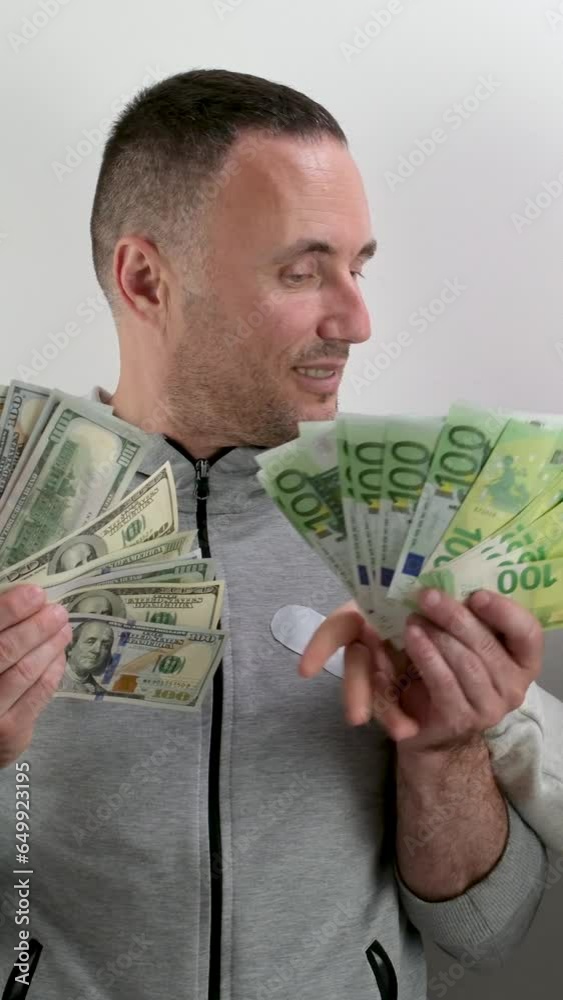 man father and husband stand with money rejoicing in life daughter and ...