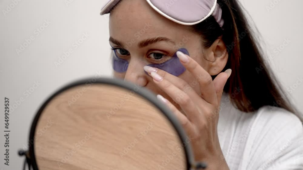 Mirror Gaze: A mirror's reflection captures a woman's satisfaction as ...