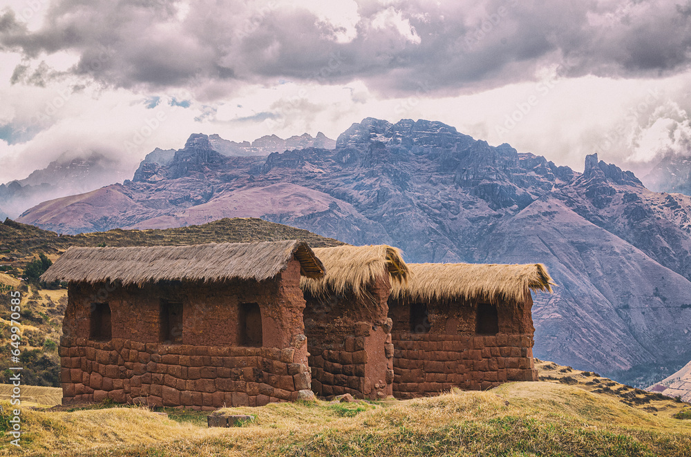 Three houses, ancient huts, in Huchuy Qosco, in Sacred valley of the ...