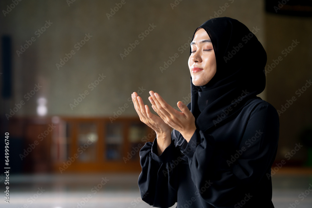 The image of an Asian Muslim woman in the Islamic religion in hijab in ...