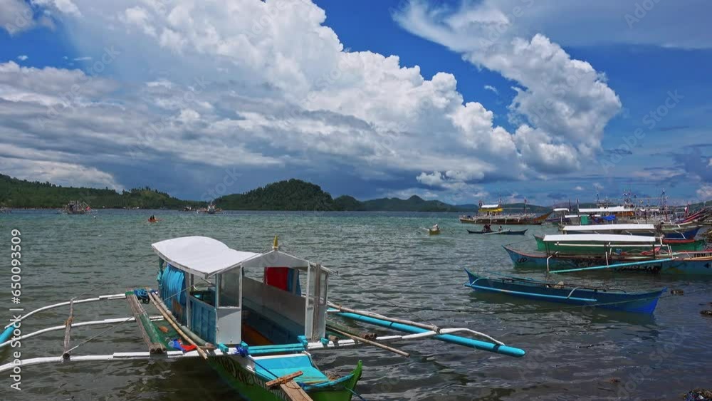 Traditional Banka Boats Floating on the Water Surface with Massive ...