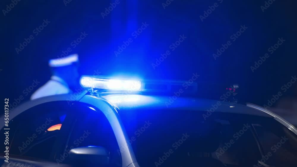 Blinking blue light flasher lightbar on police car at night, siren ...