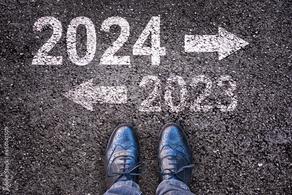 Direction 2024 written on asphalt road background with legs, new year ...