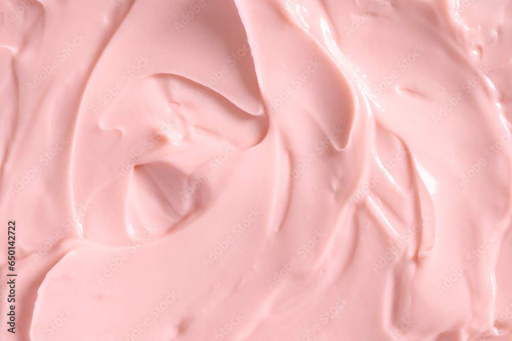 Pink skin care cosmetic beauty cream texture background in close up ...