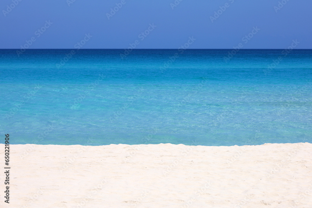 Empty sea beach with white sand, view to azure waves and blue sky ...