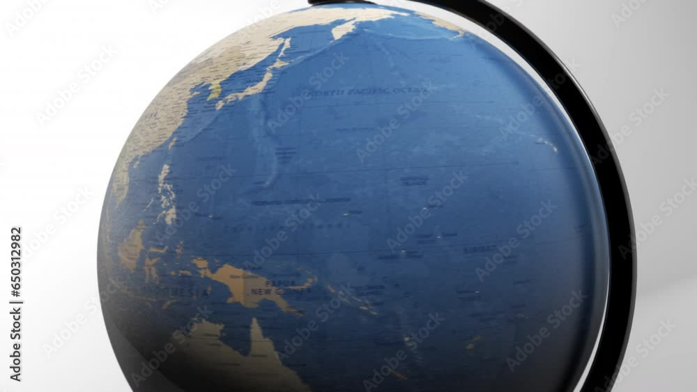 Atlas map of the world globe spinning zooming in and focusing on the ...