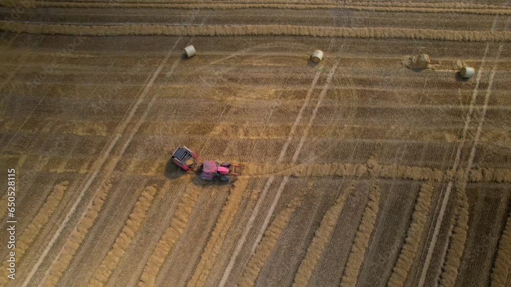 Vidéo Stock Top down aerial - a tractor with a specialized machine ...