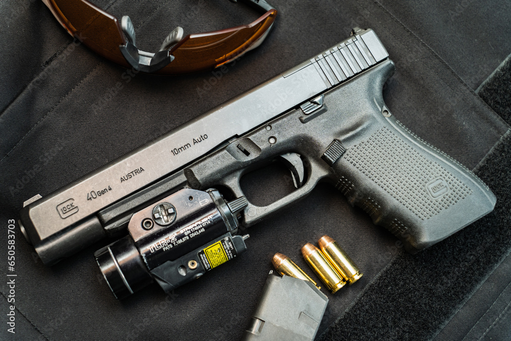 Baltic States, August 5, 2023. Tactical equipment, Glock 40 pistol with ...