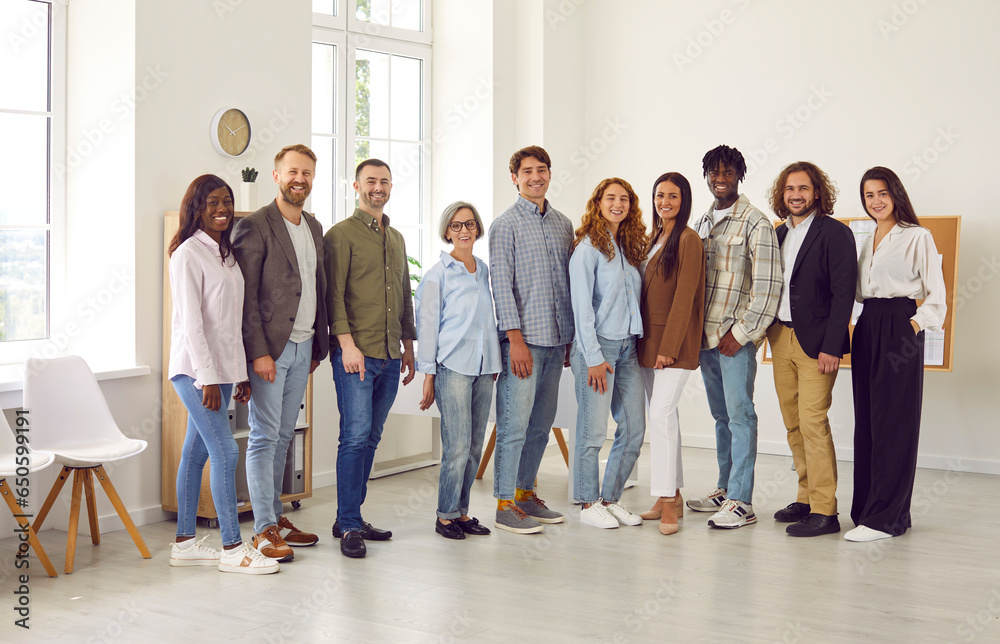Full length portrait of young happy group of business multiethnic ...