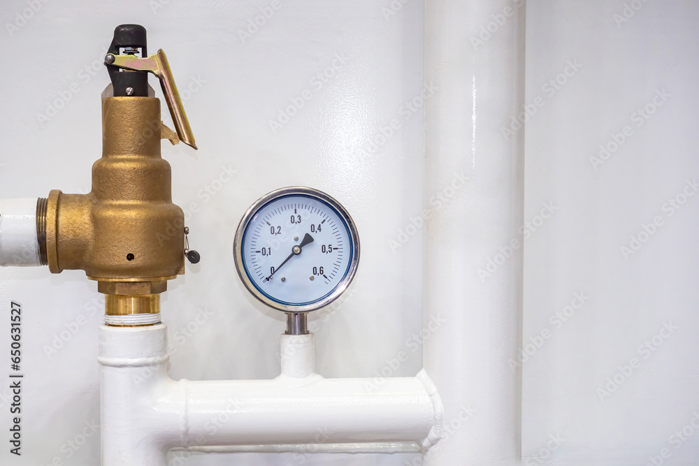 Pressure sensor on white pipe. Mechanical counter on pipeline. Sensor ...