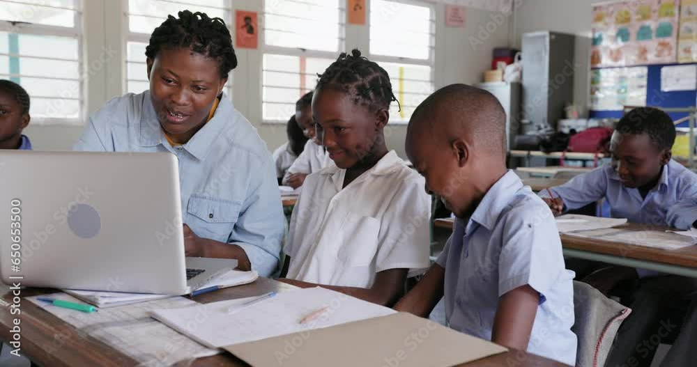 Close-up. Black African female teacher sitting and assisting African ...