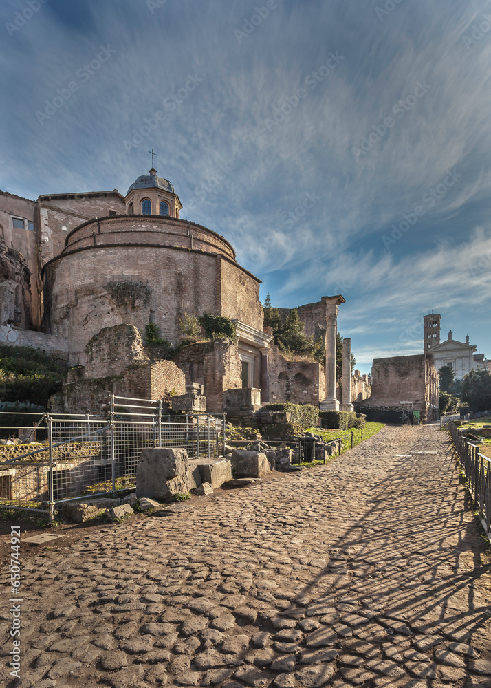 Roman road Via Sacra on Roman Forum with Temple of Romulus on the left ...