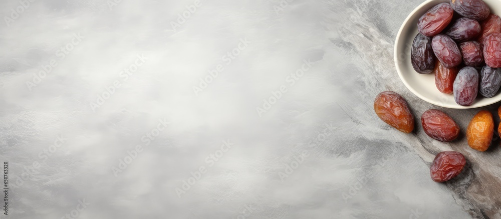 Islamic themed background with Sukkari Dates isolated pastel background ...