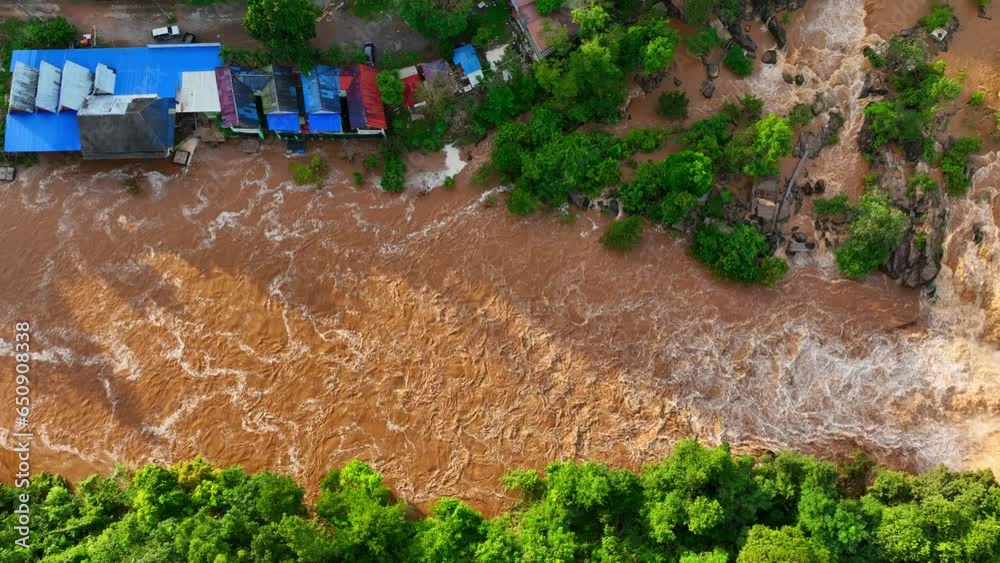 Aerial view reveals the sheer power of a waterfall flood as torrents of ...