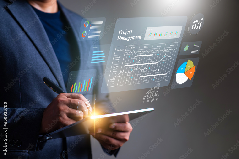 Project management concept, businessman working with schedule plan to ...