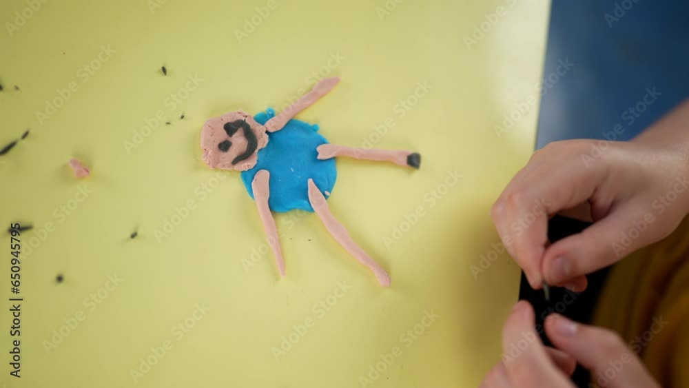 Creative stick figure made with child modeling clay. kid using ...