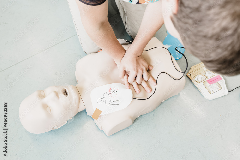 Photo & Art Print First aid cardiopulmonary resuscitation course using ...
