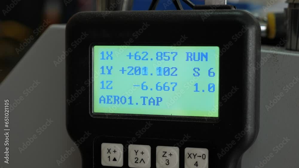 The control panel of the woodworking machine with CNC. The screen of a ...