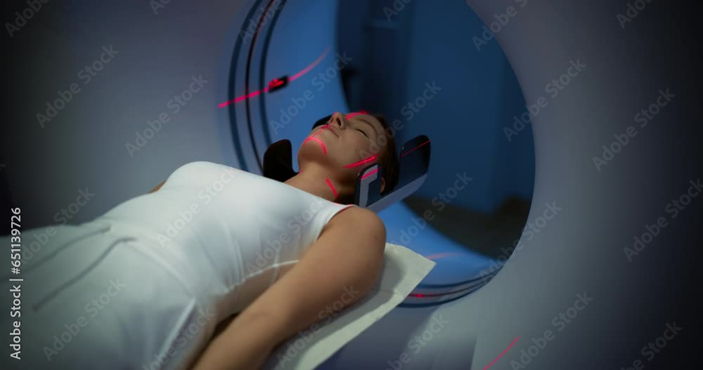 Close-up Portrait Shot of a Female Patient Lying on a CT or MRI Scan ...