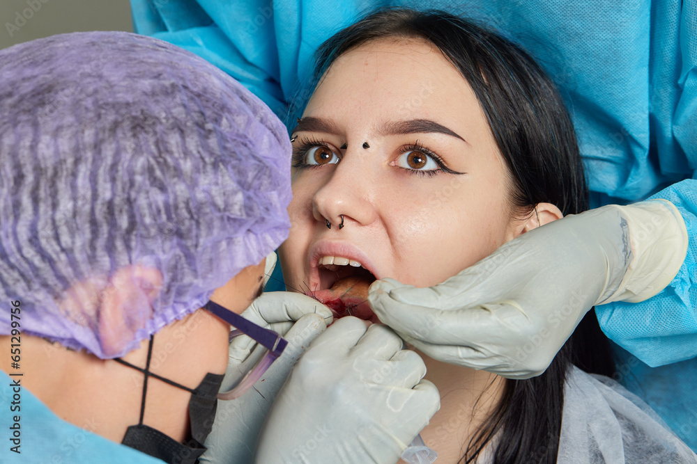 tongue splitting. cutting the tongue, one type of modification of the ...