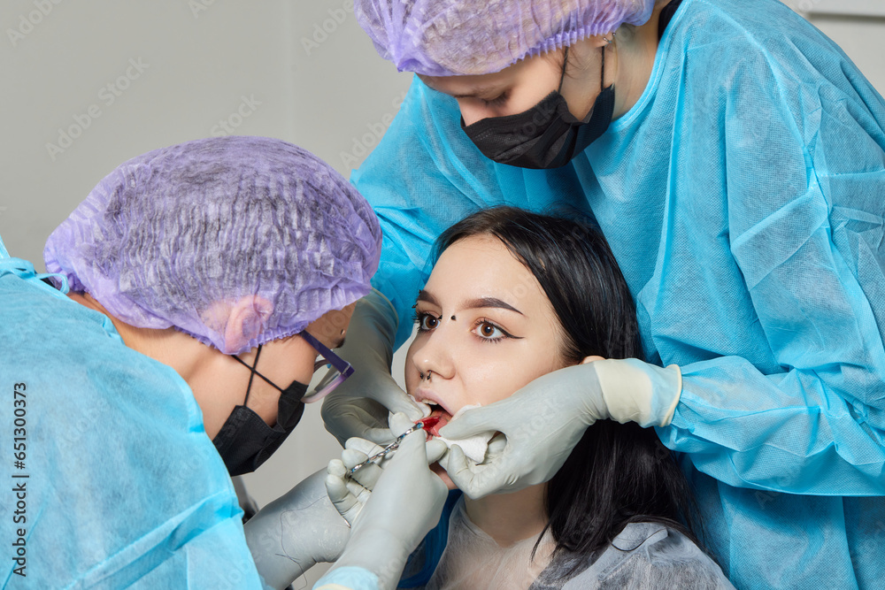 tongue splitting. cutting the tongue, one type of modification of the ...