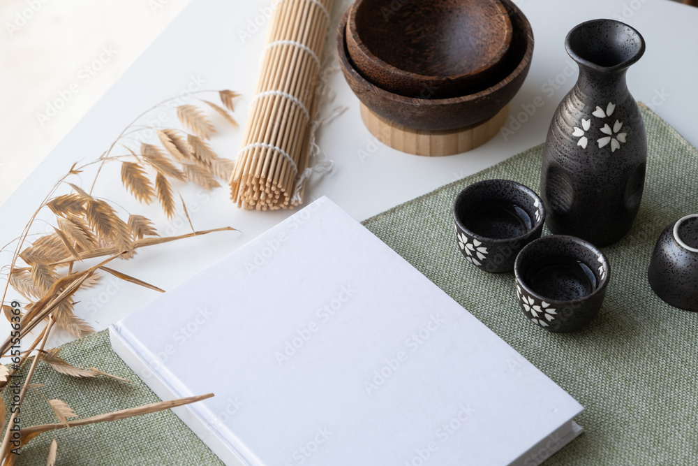 Book mockup design. Blank white book on dining table in asian style ...