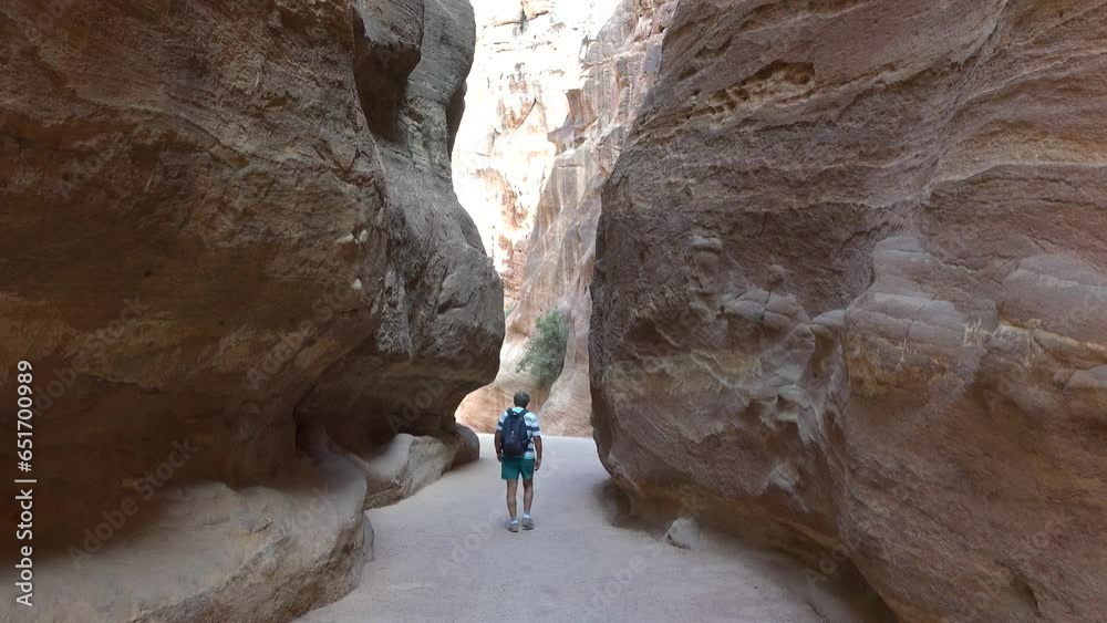 A tourist in Petra. Historical city. Unesco heritage site. A ...