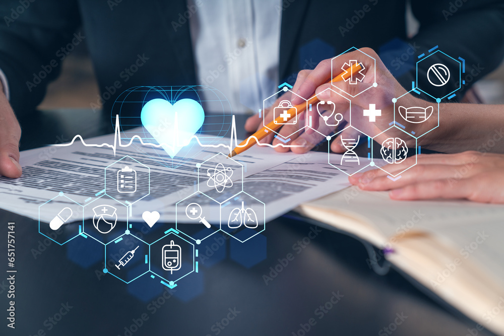 Businesspeople in formal wear taking notes signing contract at office ...