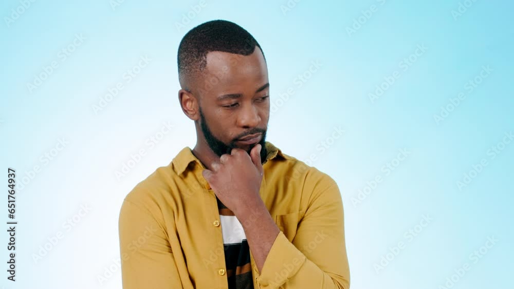 Confused, man and thinking of ideas in studio for planning, question ...
