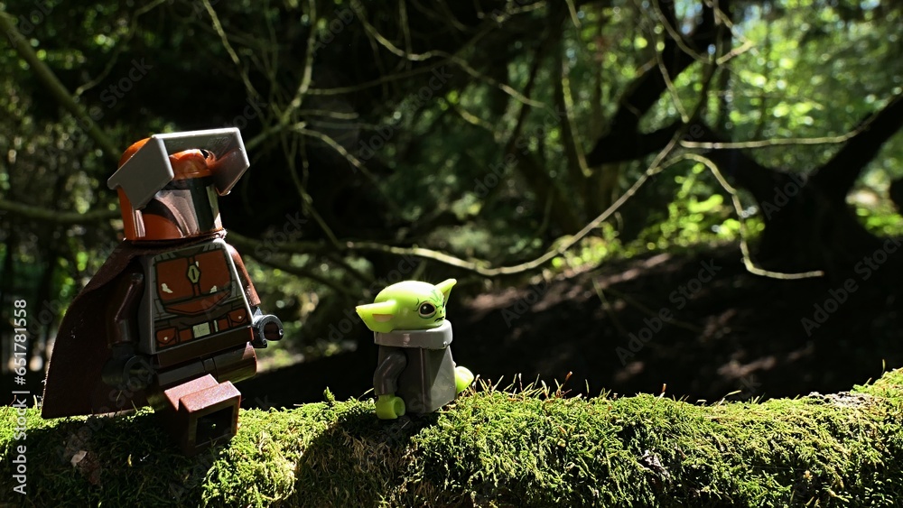 LEGO Star Wars figures of Mandalorian warrior in brown armor and helmet ...