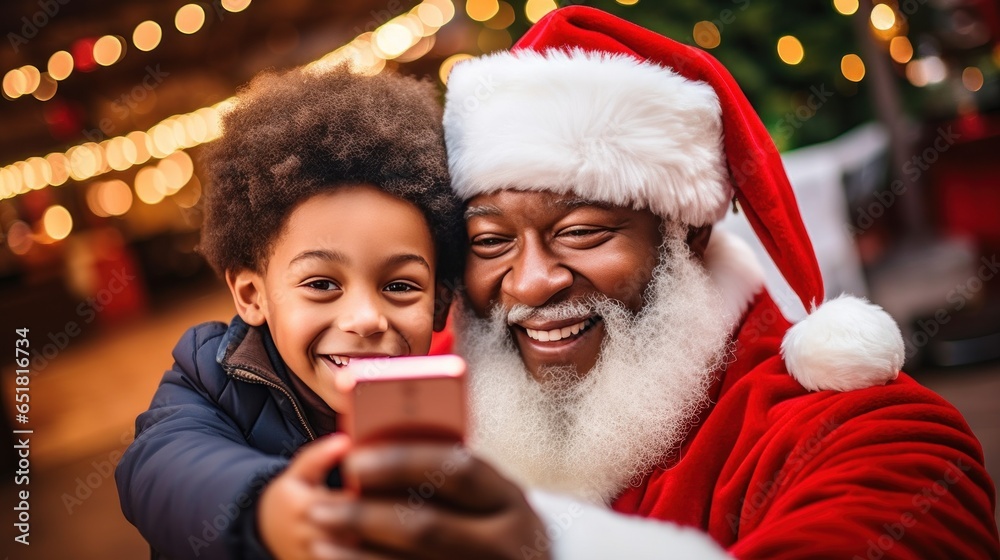 Santa taking a selfie with excited child Stock Photo | Adobe Stock